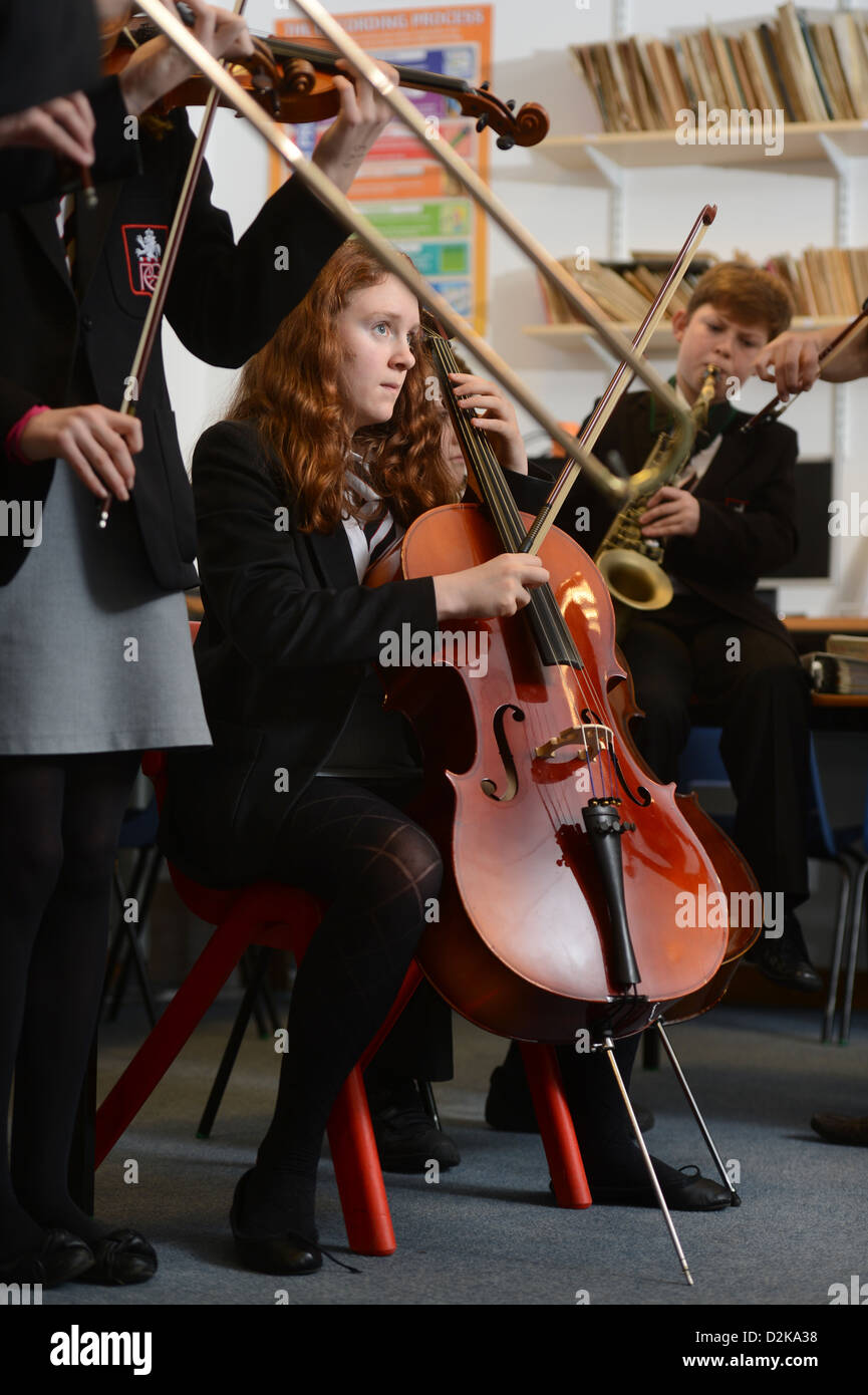 A girl with a cello during an orchestra practice at Pates Grammar ...