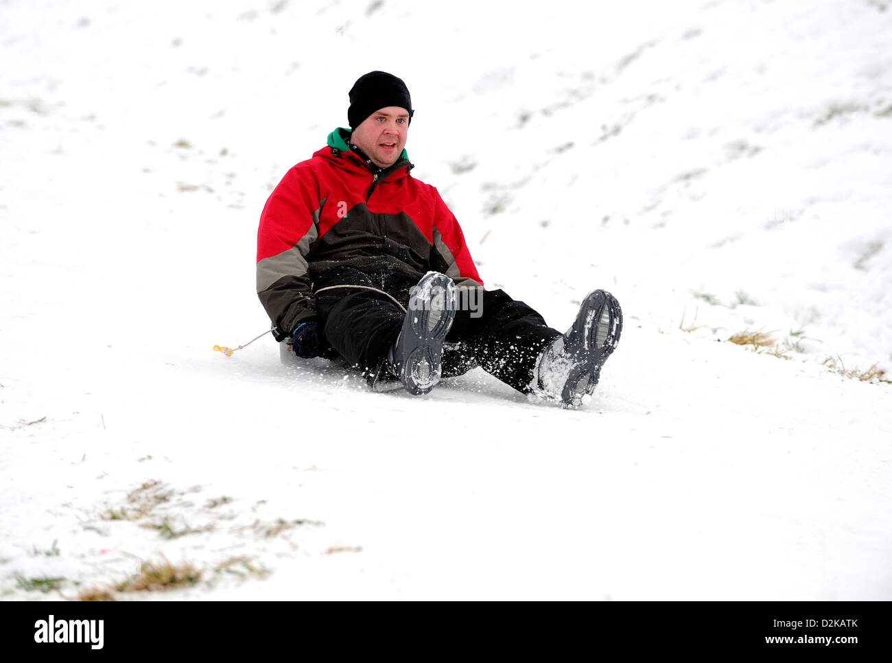 Sliding down snow slope hi-res stock photography and images - Alamy
