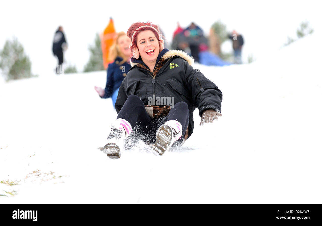 Sliding down snow slope Cut Out Stock Images & Pictures - Alamy