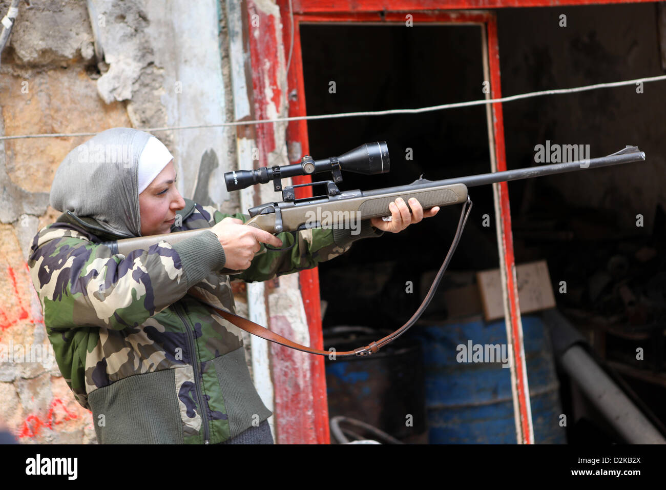 Syrian rebels from the Katiba Al Wahad unit of the Lewah Al Wad Brigade ...