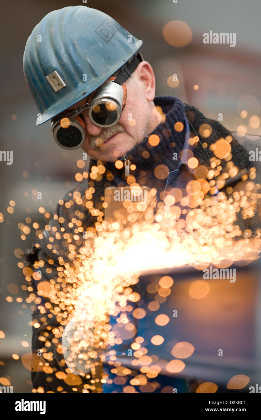 Dresden, Germany, a steel construction mechanic with a cutting torch ...