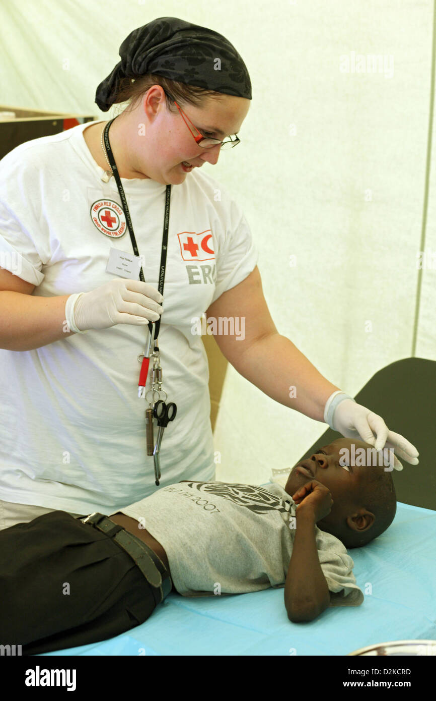 Red cross boy earthquake hi-res stock photography and images - Alamy