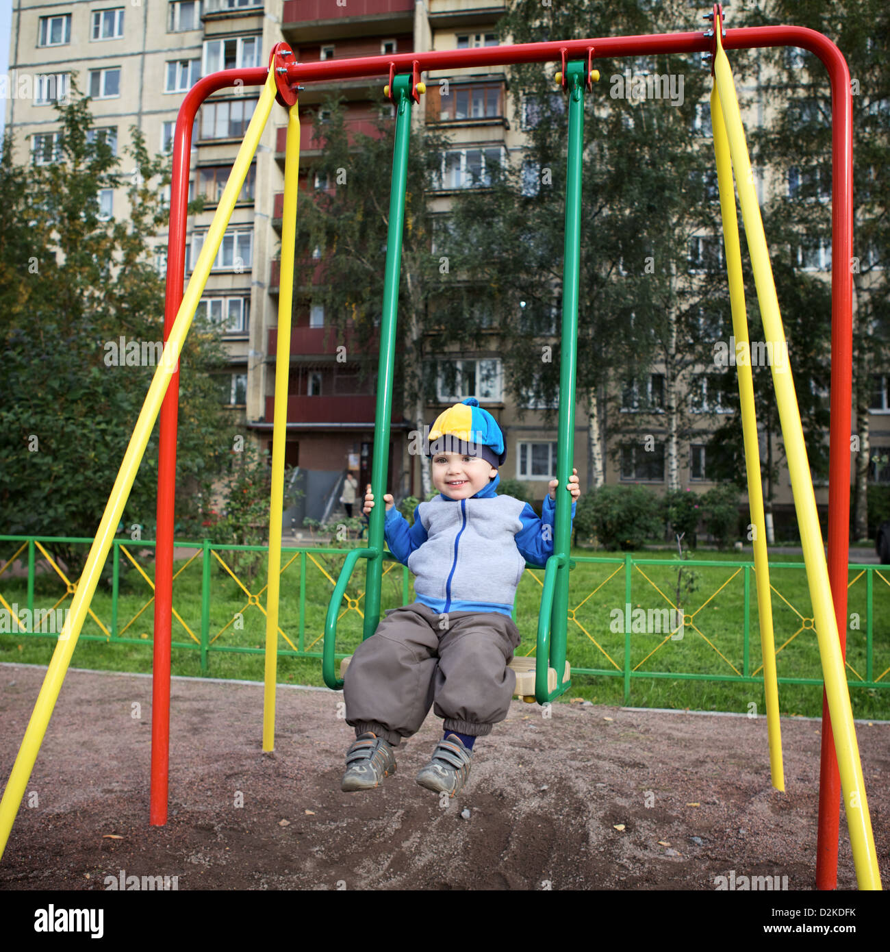 little boy teeter on playground at autumn Stock Photo - Alamy