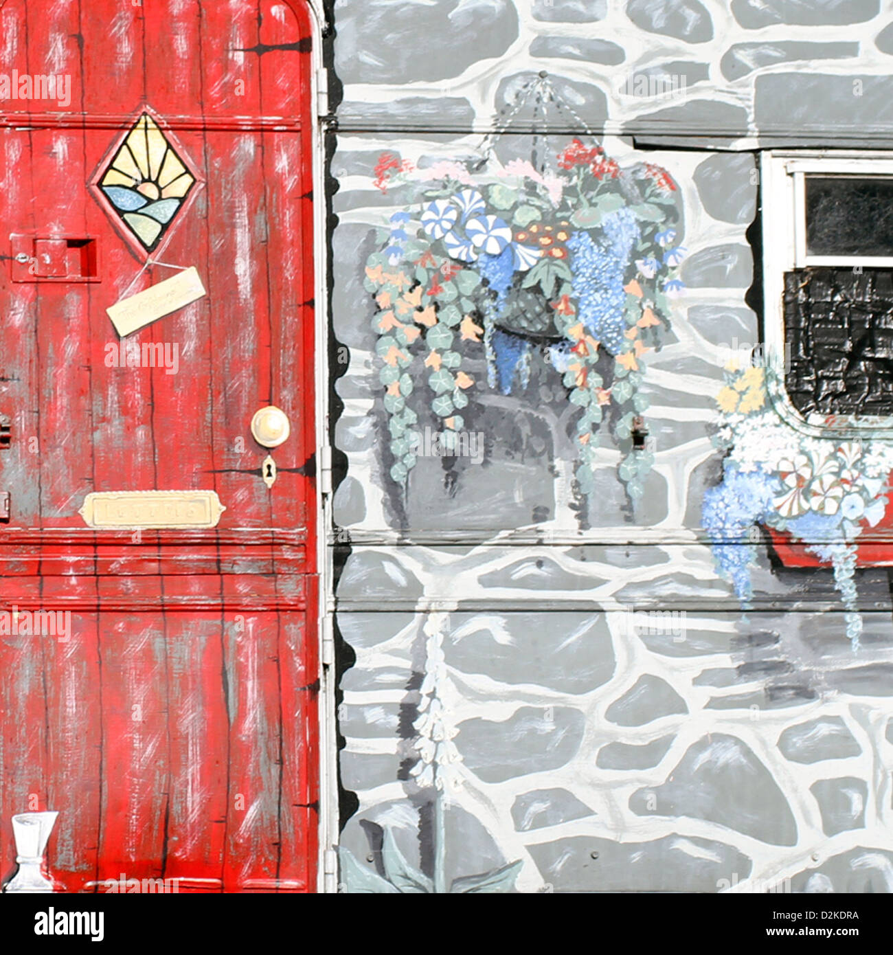 Painting on side of a caravan squarely cropped Stock Photo - Alamy