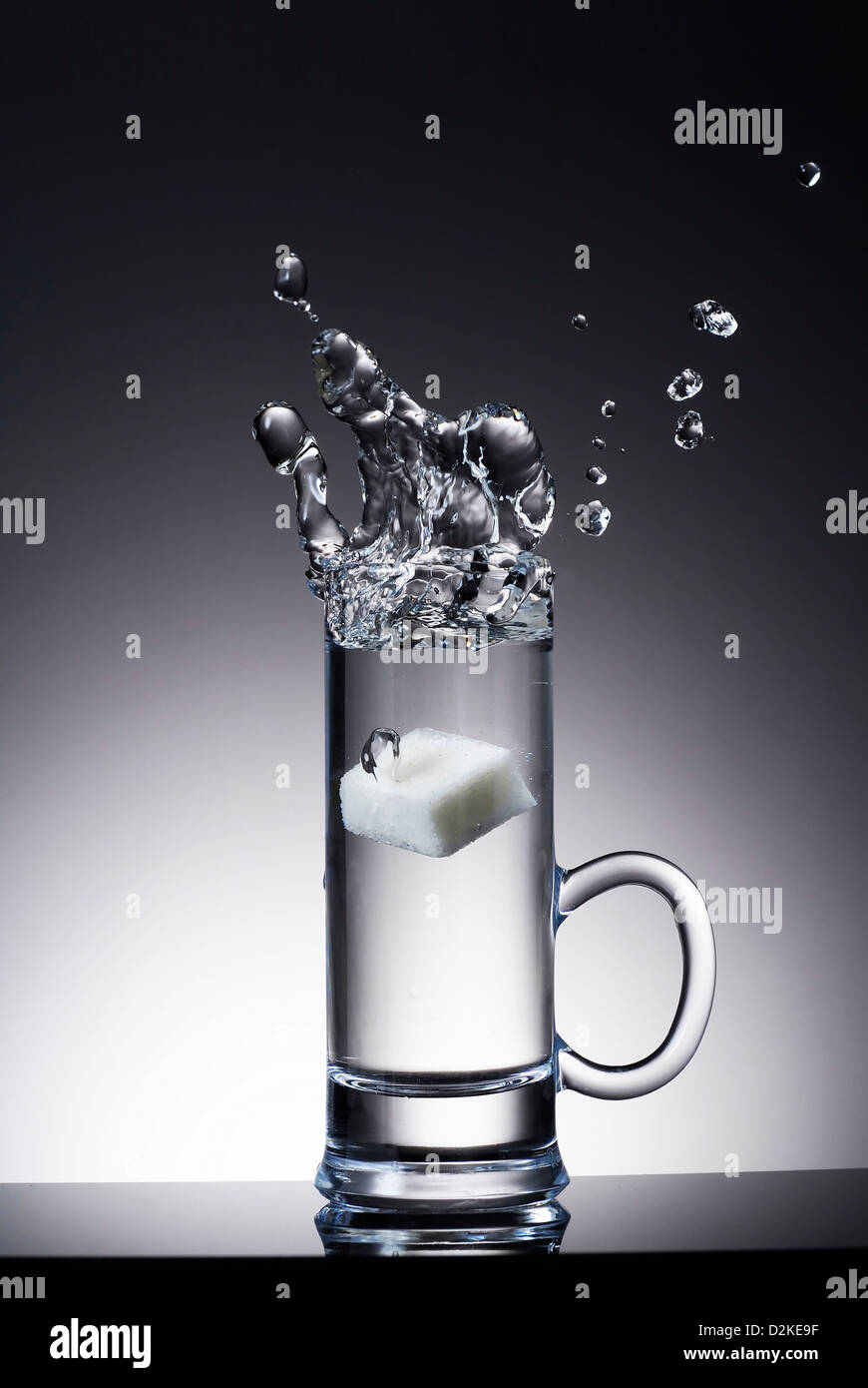 sugar cube splash Stock Photo - Alamy