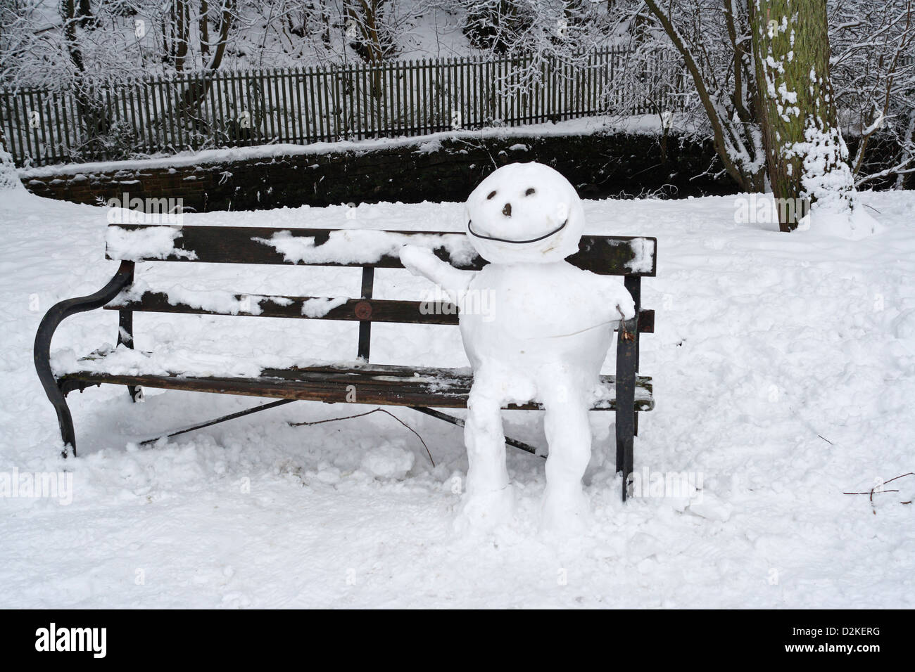Snow man sitting on bench hi-res stock photography and images - Alamy