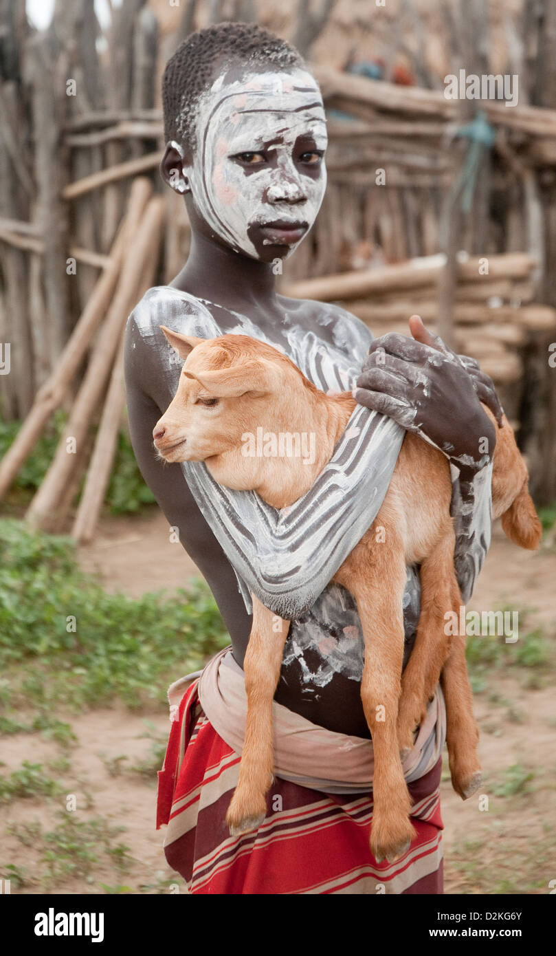 Man holding baby goat hi-res stock photography and images - Alamy