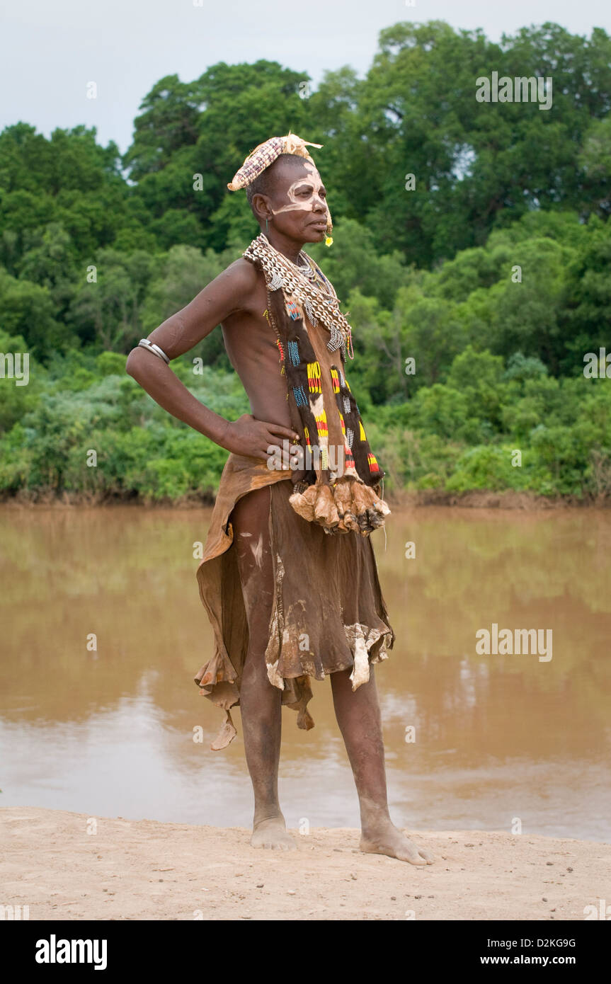 Portrait of decorated Kara woman showing Omo River below Stock Photo ...