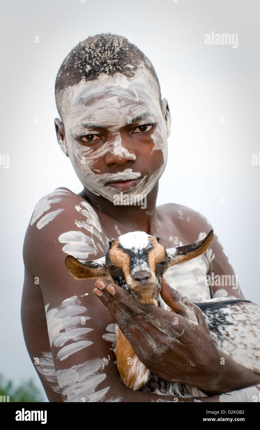 Man holding baby goat hi-res stock photography and images - Alamy