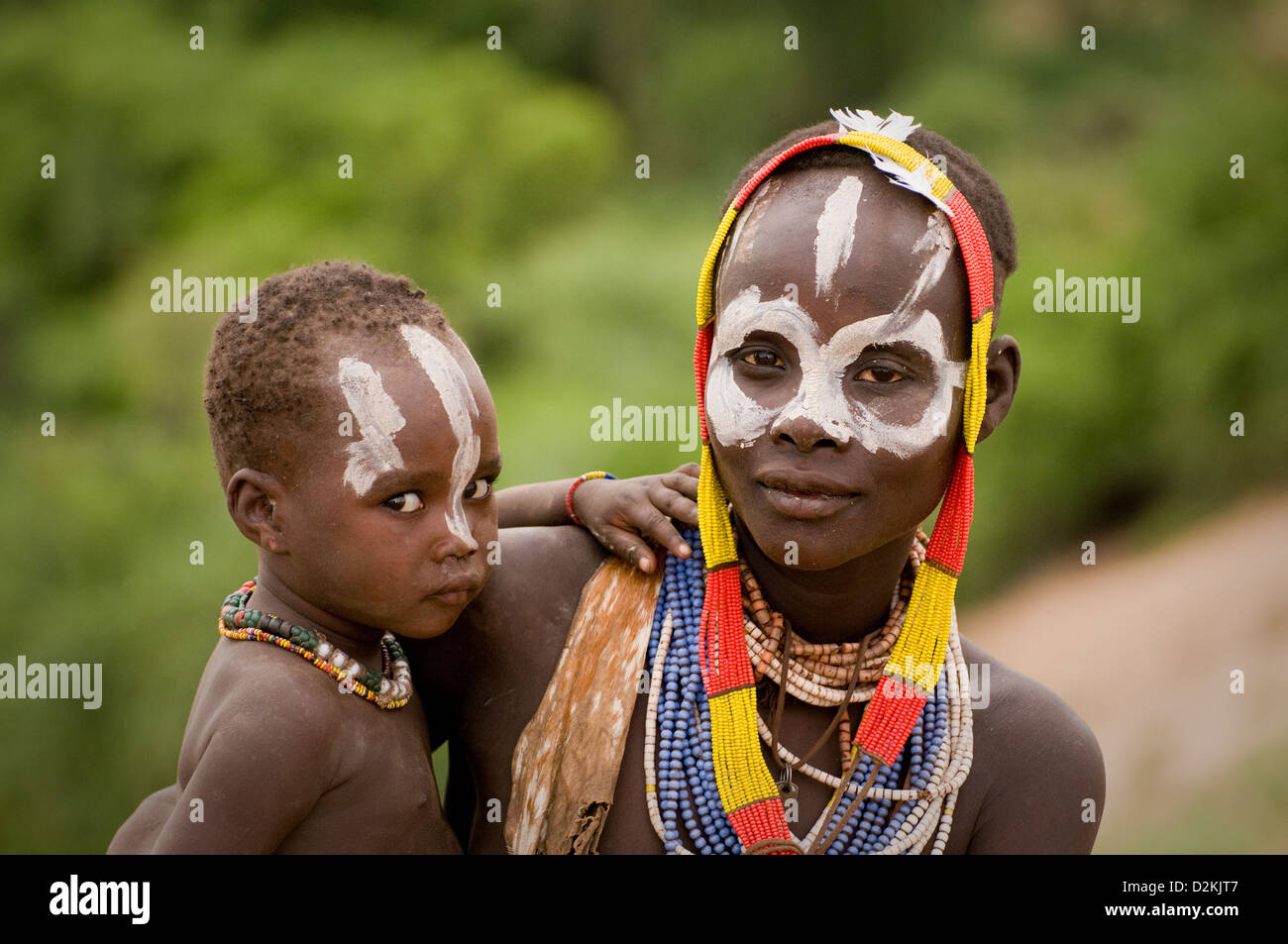 Portrait of decorated Kara woman and her baby Stock Photo - Alamy