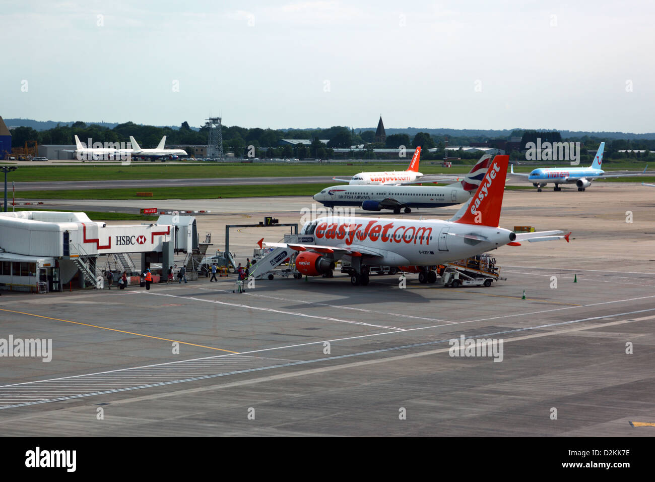 Easyjet, British Airways and Thomson aircraft parked on apron at South ...