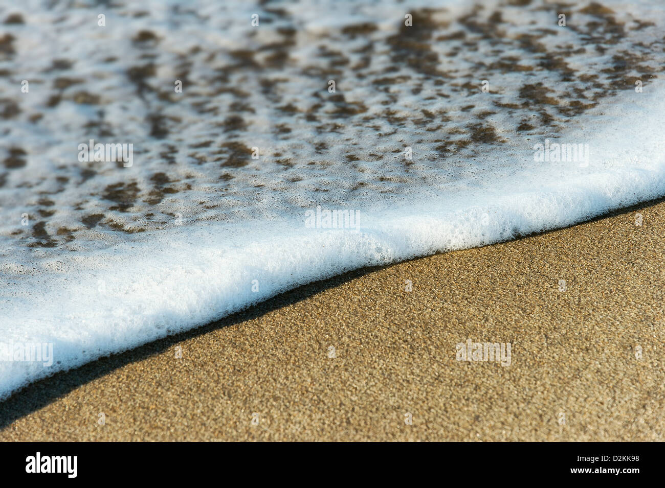 Ocean meets beach Stock Photo - Alamy