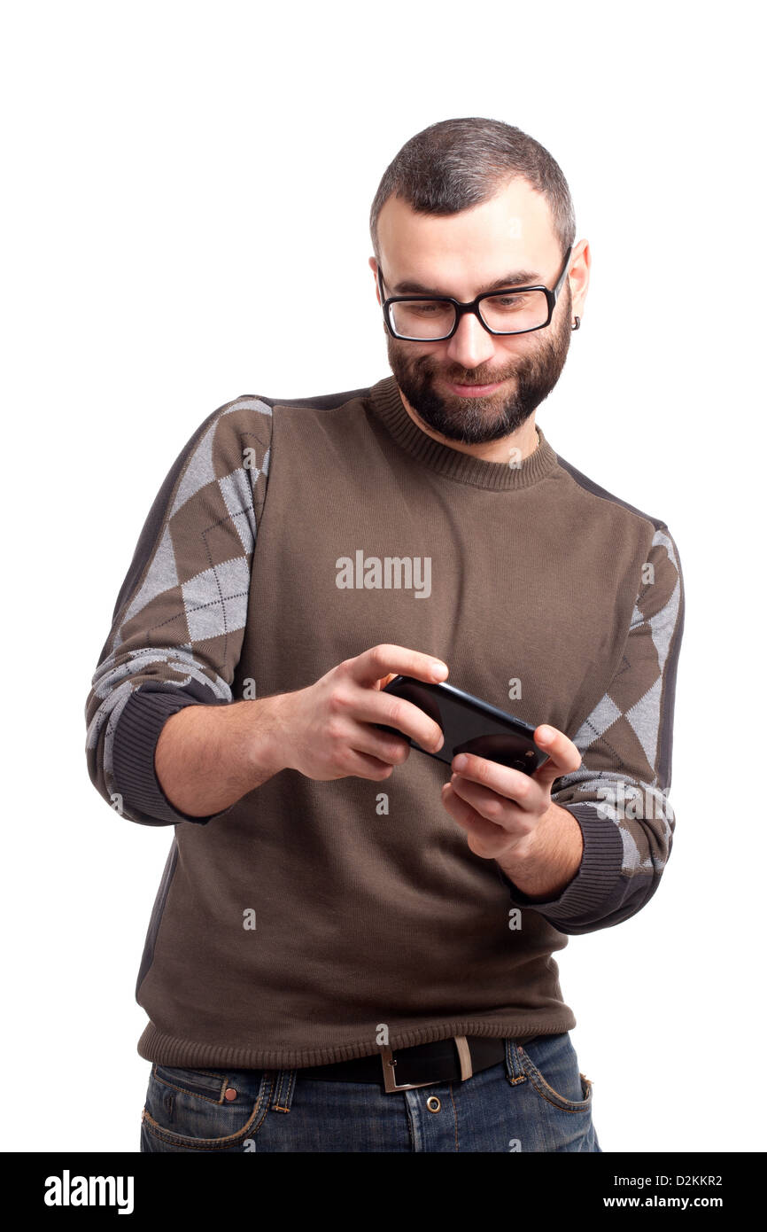 Young man playing games on smartphone Stock Photo - Alamy