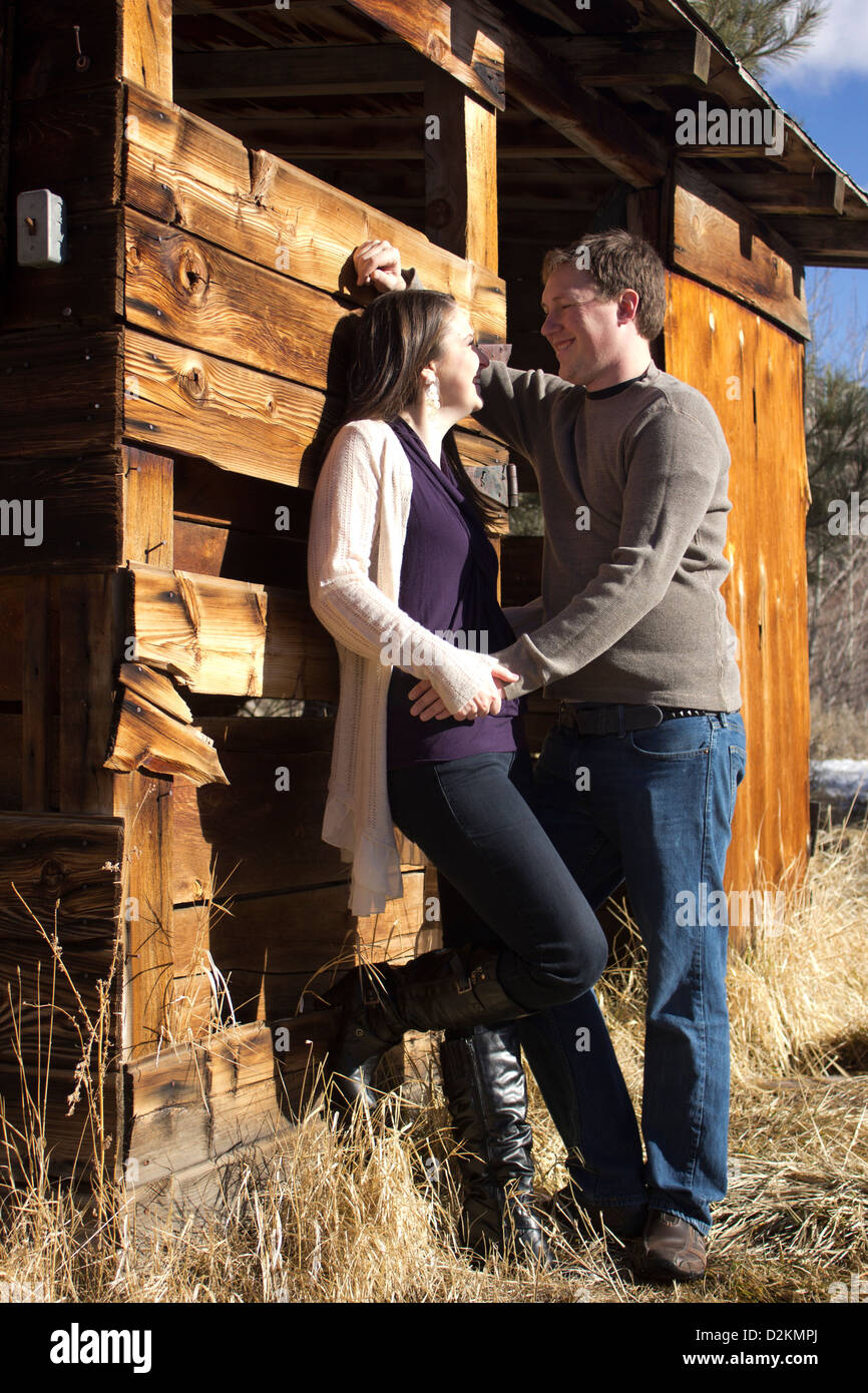 a young couple in love by an old barn Stock Photo - Alamy