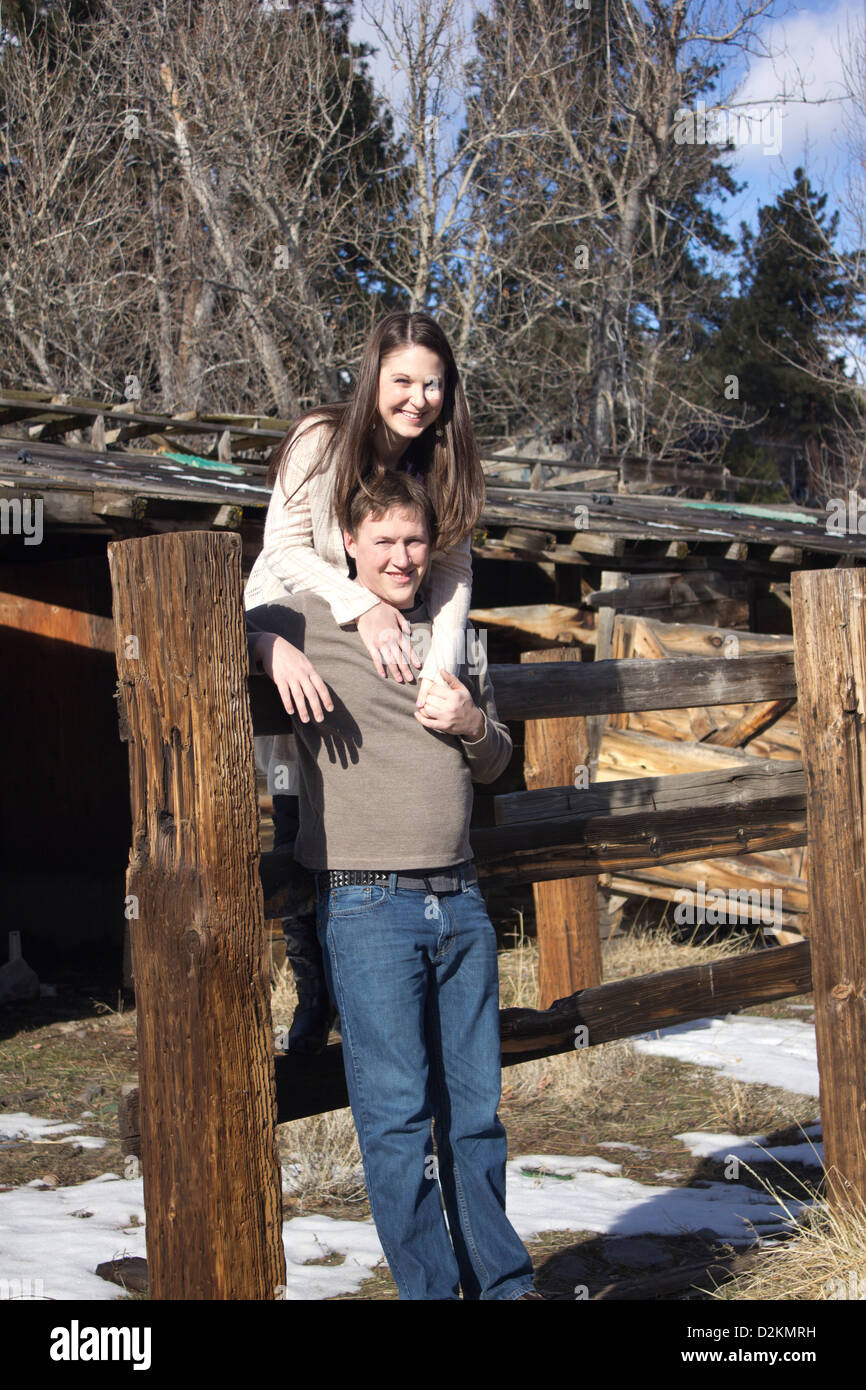 a young couple in love by an old barn Stock Photo - Alamy