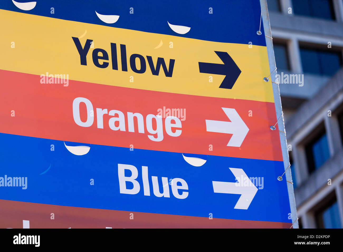 Color coded directions on banner Stock Photo - Alamy