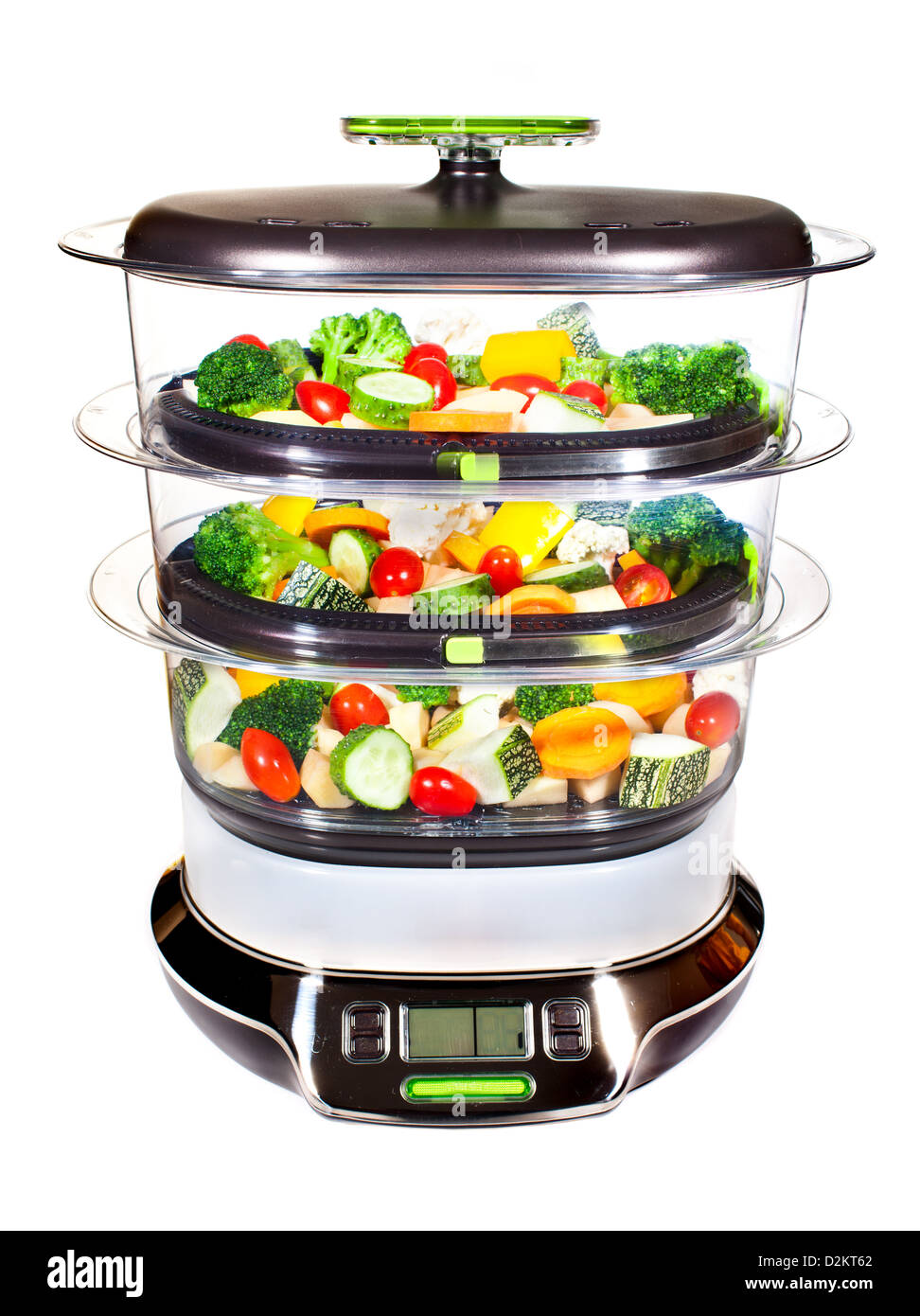 steam cooker with vegetables on a white background Stock Photo - Alamy