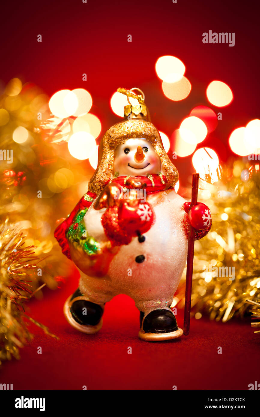 Snowman on the red background Stock Photo - Alamy