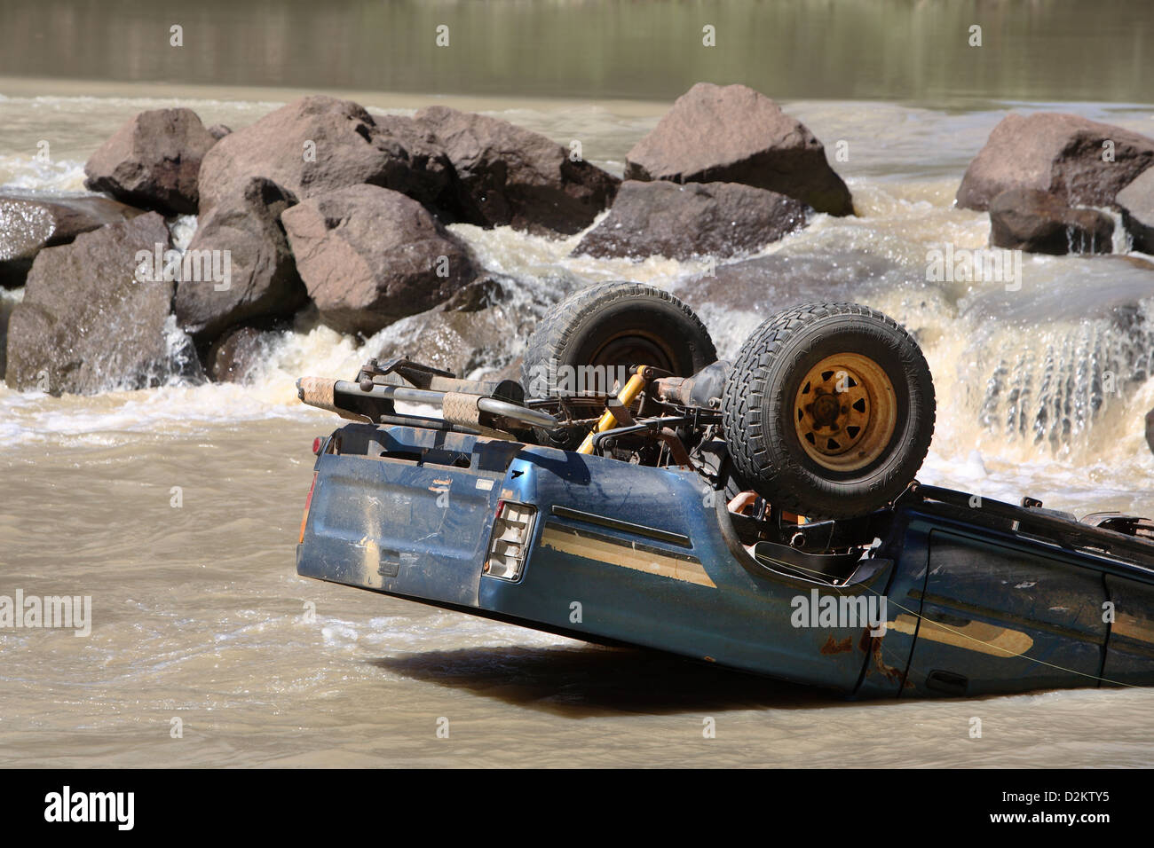 Car swept away by water at Cahill's crossing. Kakadu National Park ...