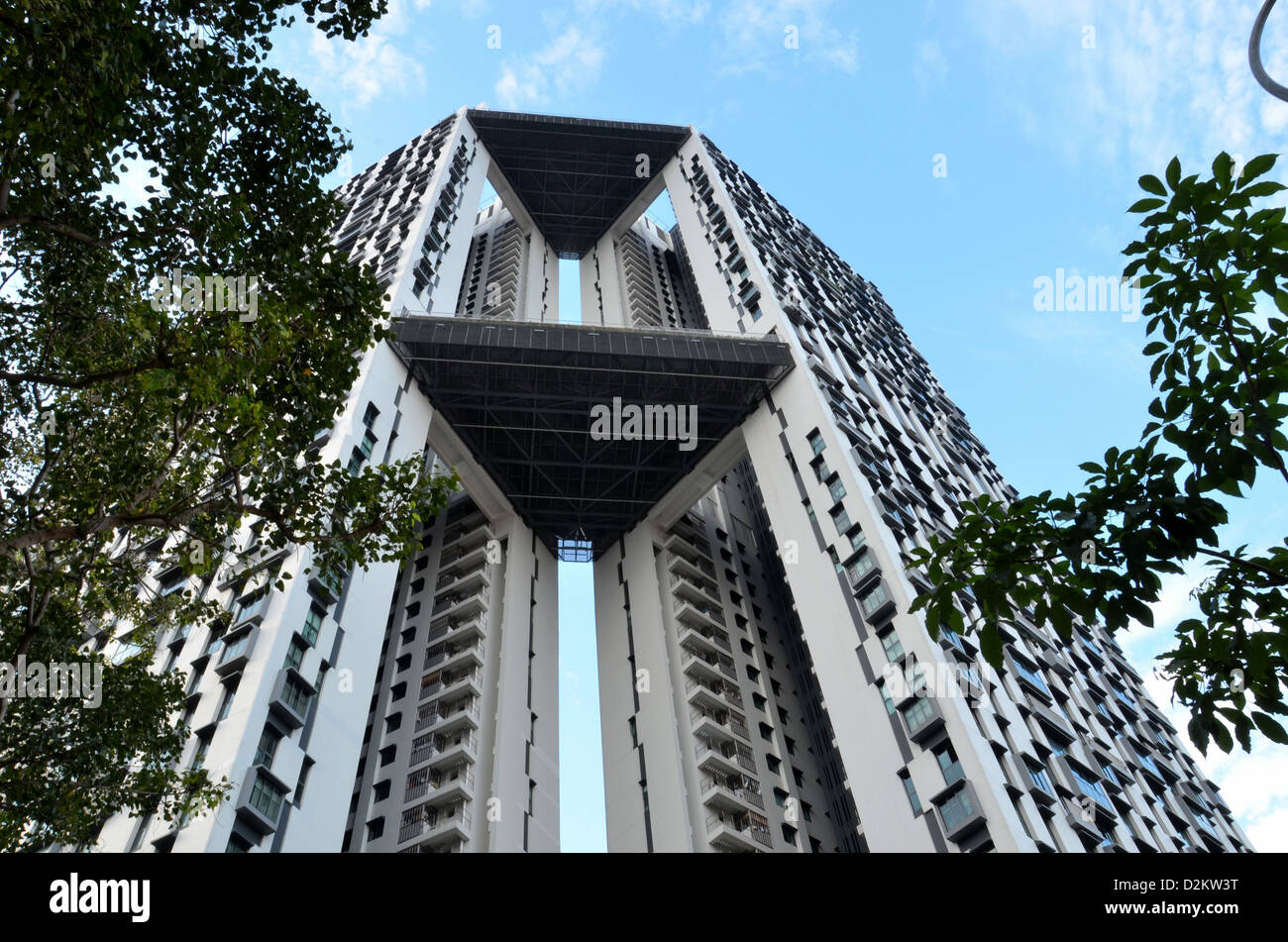 An imposing view of a modern high rise apartment building in Singapore ...