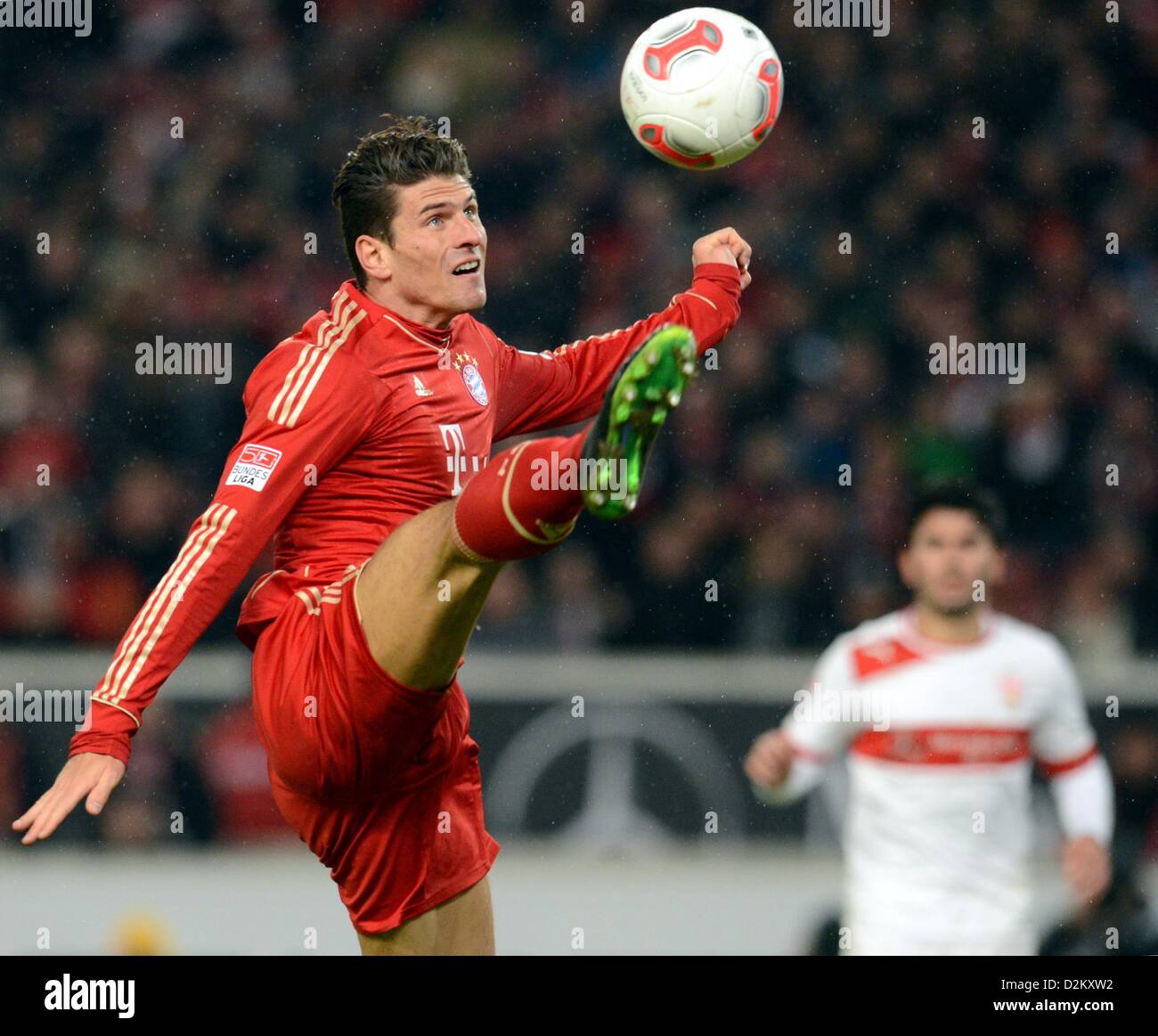 Stuttgart, Germany. 27th January 2013. Munich's Mario Gomez plays the ...