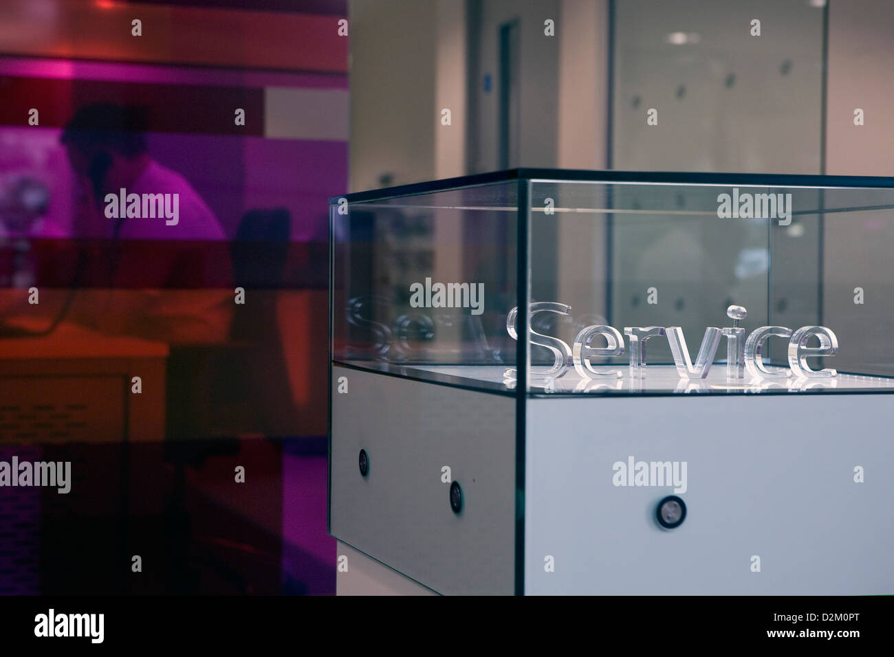 A Service illuminated sign in a newly built company Stock Photo - Alamy