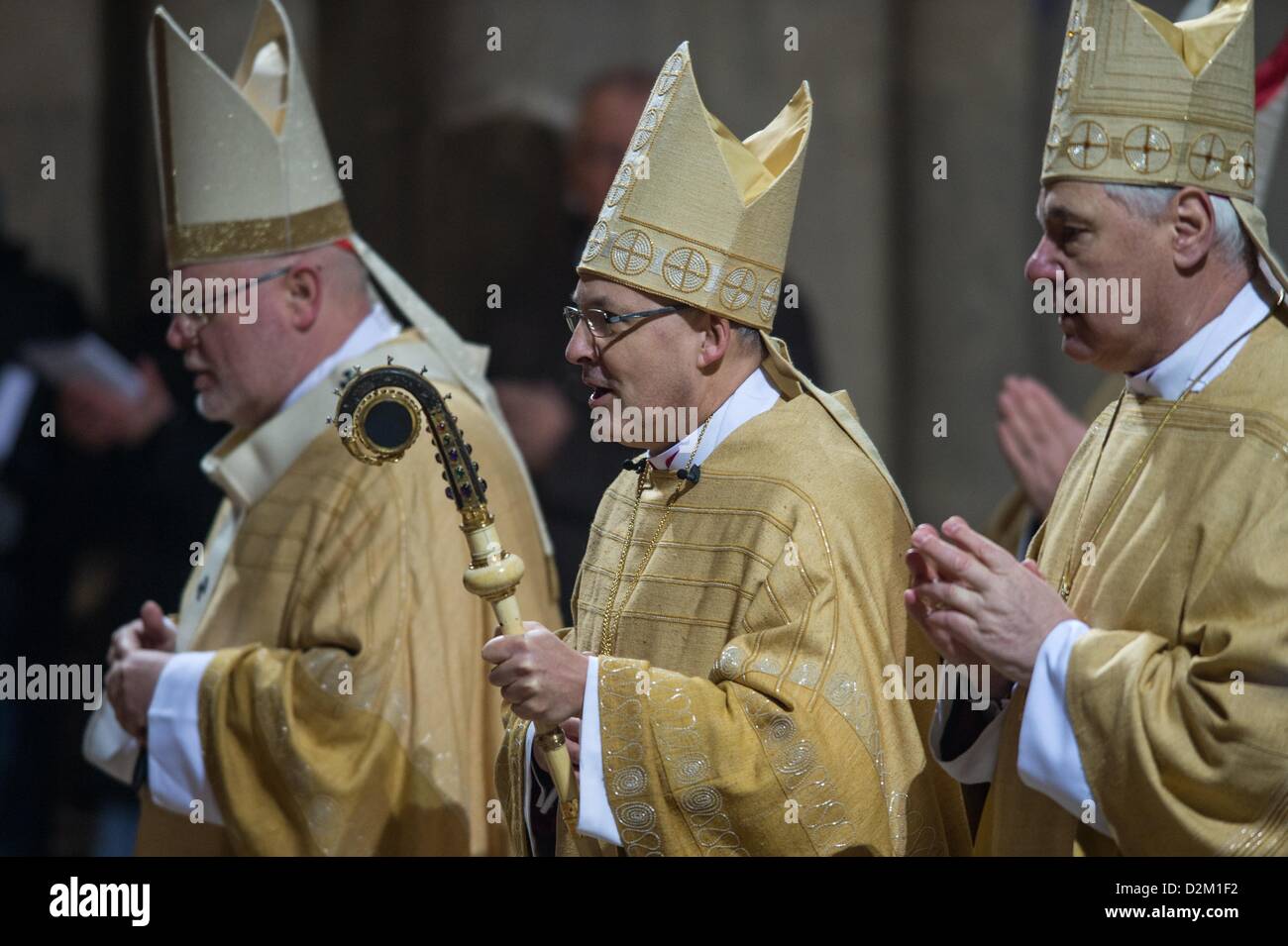 New bishop of Regensburg, Rudolf Voderholzer (C), stands next to ...