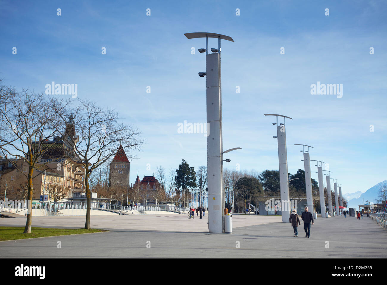 People walking along harbour promenade, Ouchy, Lausanne, Vaud ...