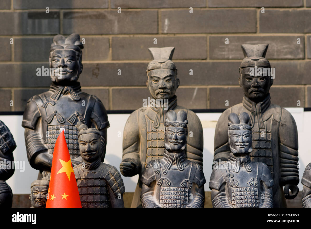 terracota statues with chinese flag, xian, china Stock Photo - Alamy