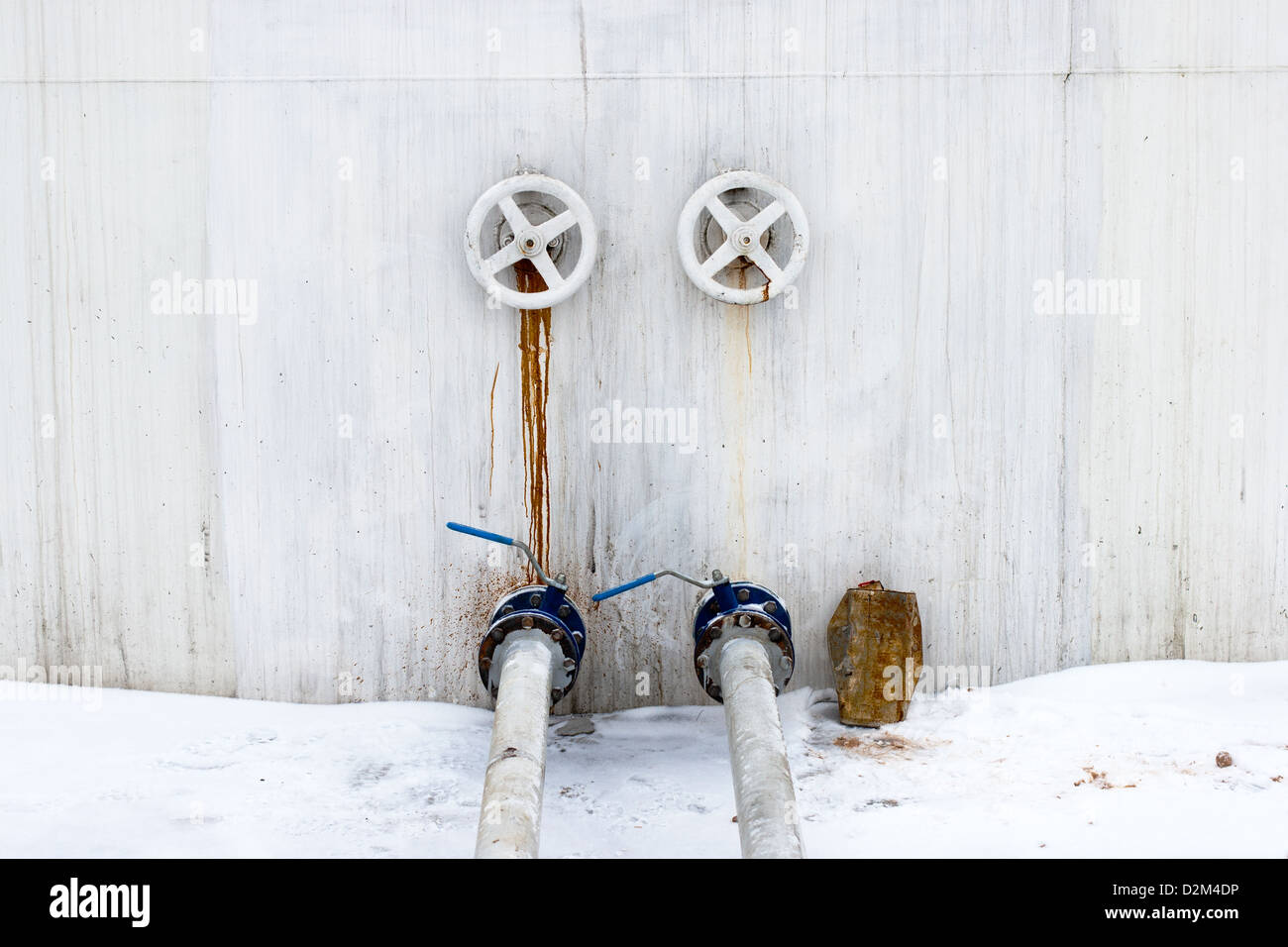 Ball valves and pipes on the tank wall Stock Photo - Alamy
