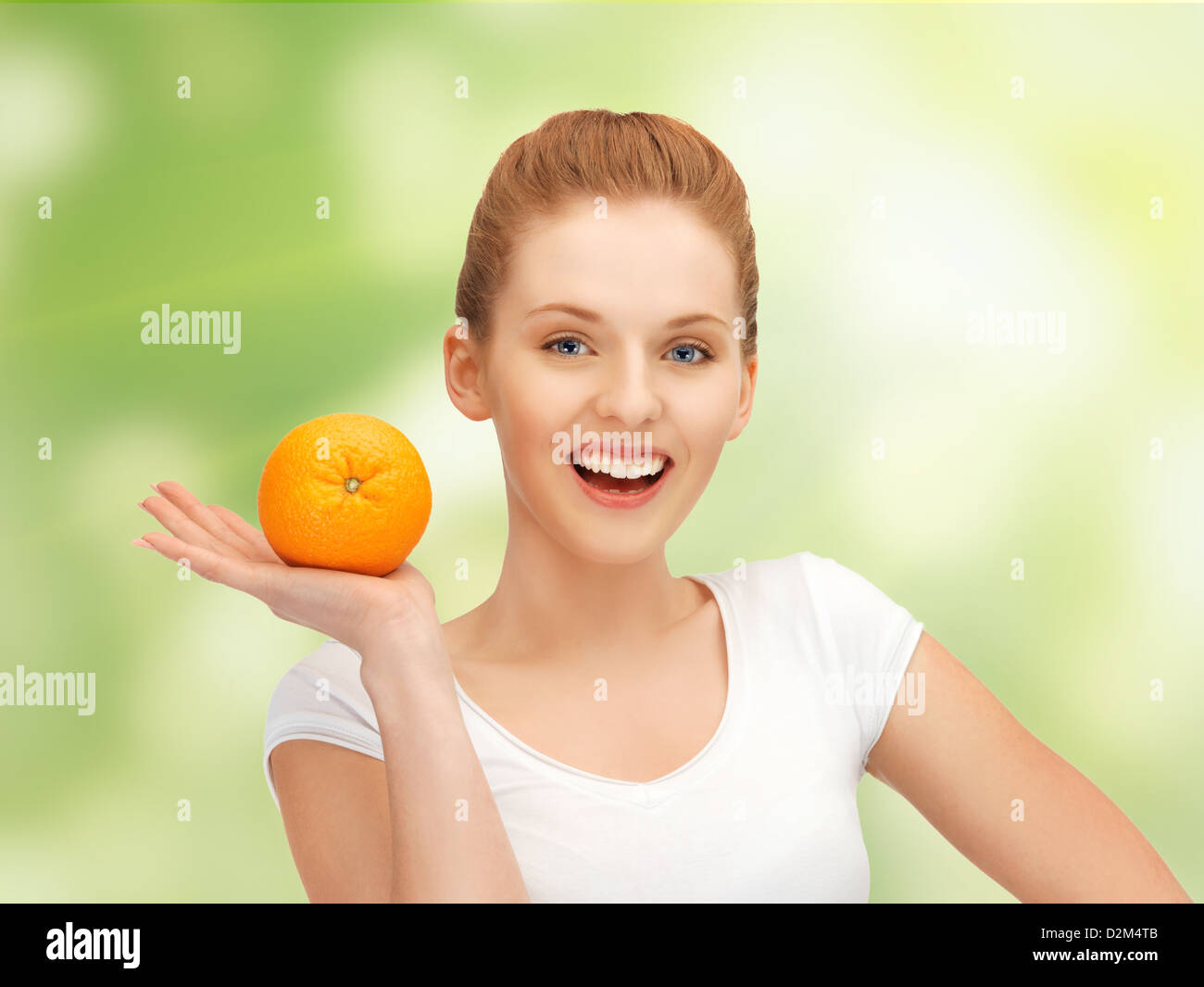teenage girl with orange Stock Photo - Alamy