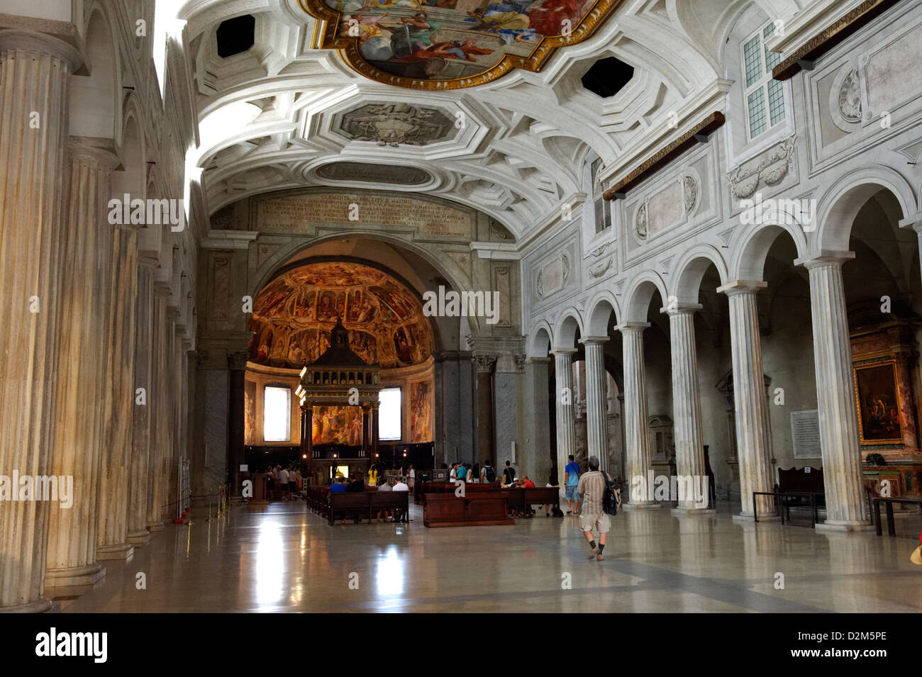 Rome. Italy. View of the colonnade interior and frescoed ceiling of San ...