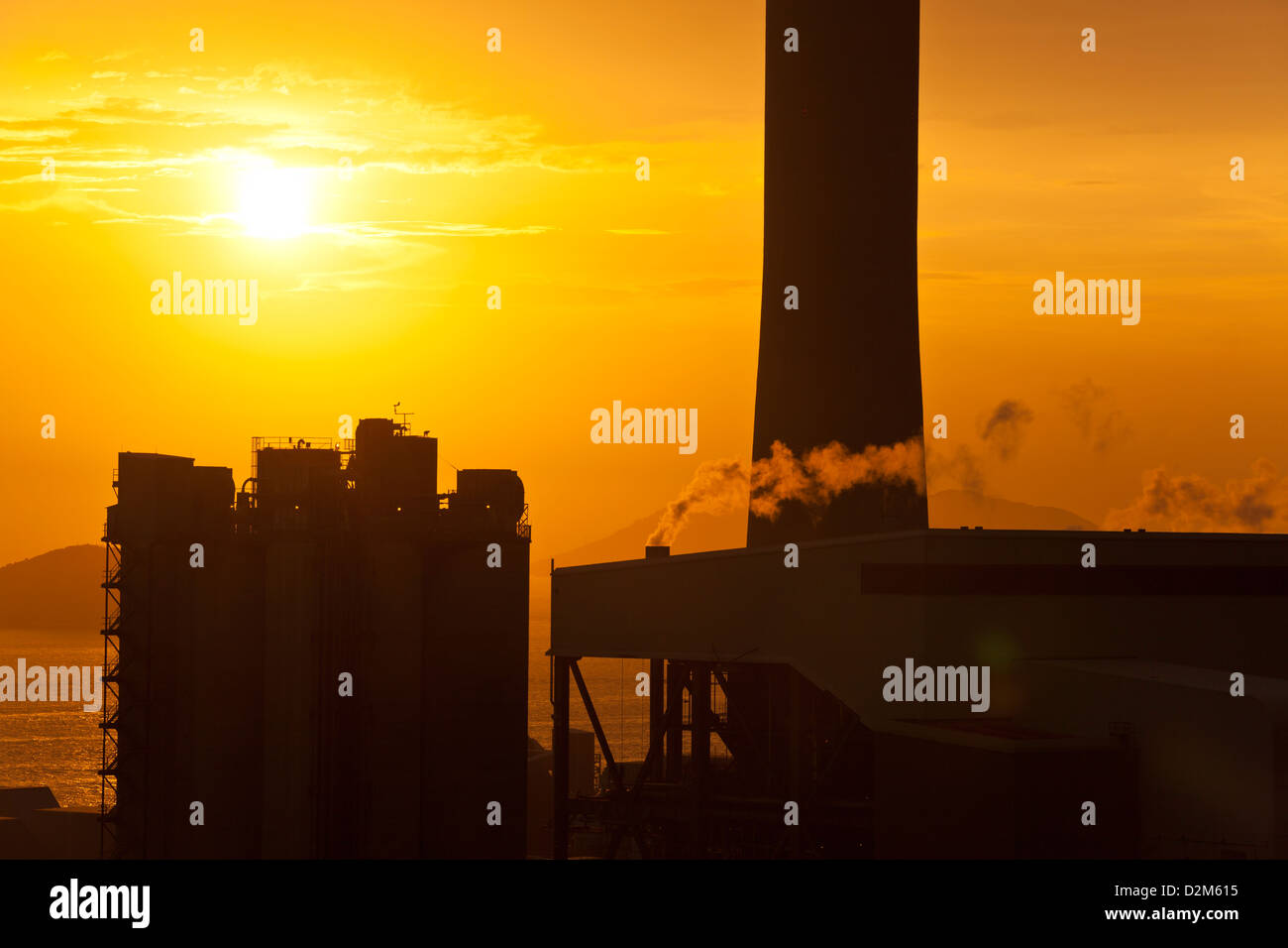 Air pollution from factories in sunset Stock Photo - Alamy