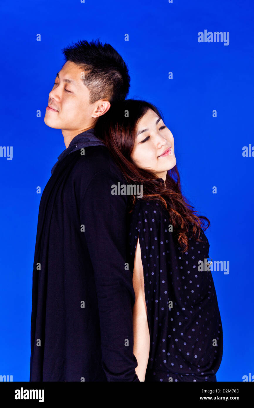 Asian couple relax together Stock Photo - Alamy