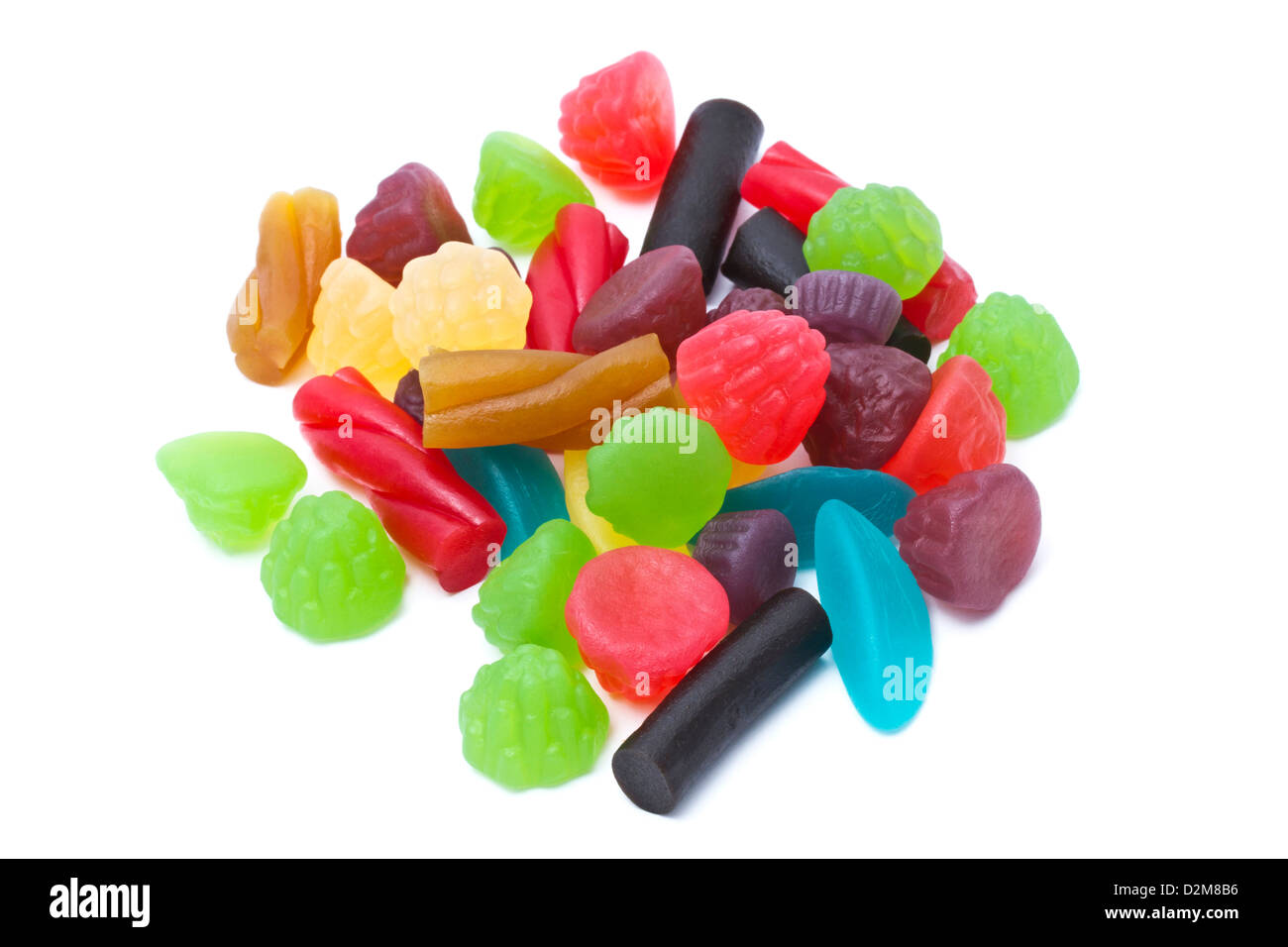 Colorful fruits candy closeup on white background Stock Photo - Alamy