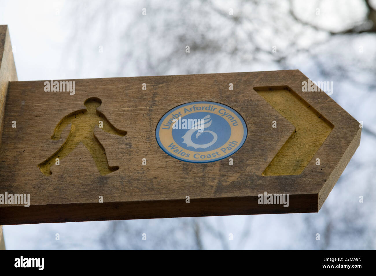 Gwynedd North Wales All Wales Coastal Path sign attached to a wooden ...