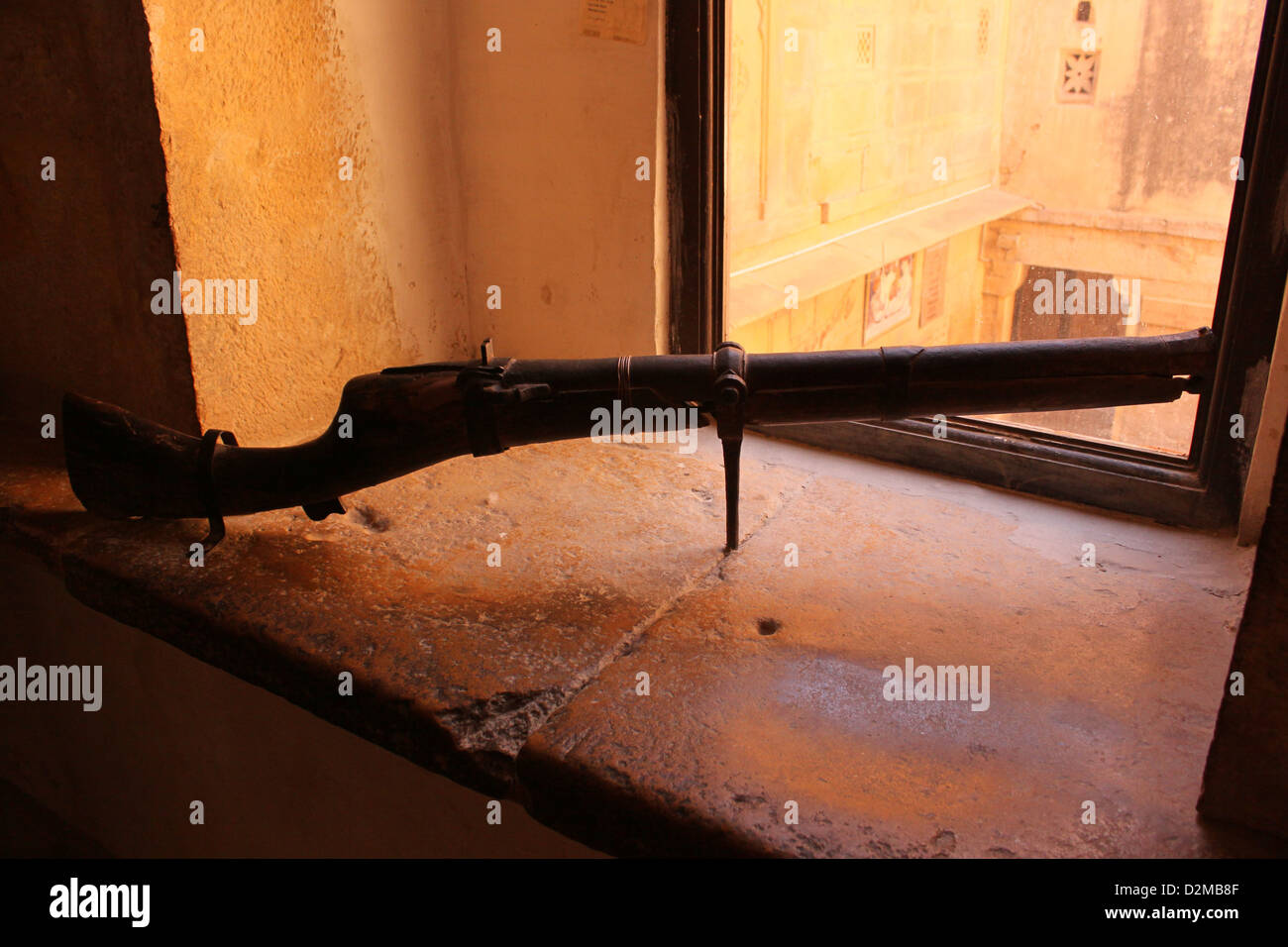 Gun pointing out of a window, symbol of power, jaisalmer Rajasthan ...