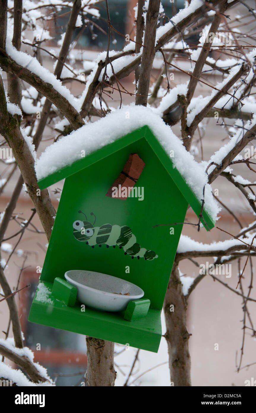 Bird table in the snow Stock Photo - Alamy
