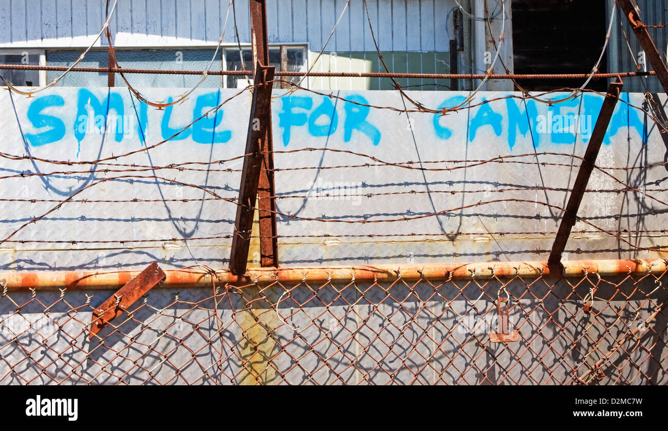 smile for camera painted on wall Stock Photo - Alamy