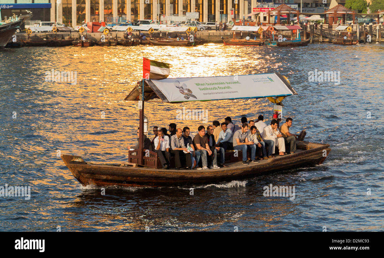 Dubai Creek, Dubai, UAE - with Abra boat crossing Stock Photo - Alamy