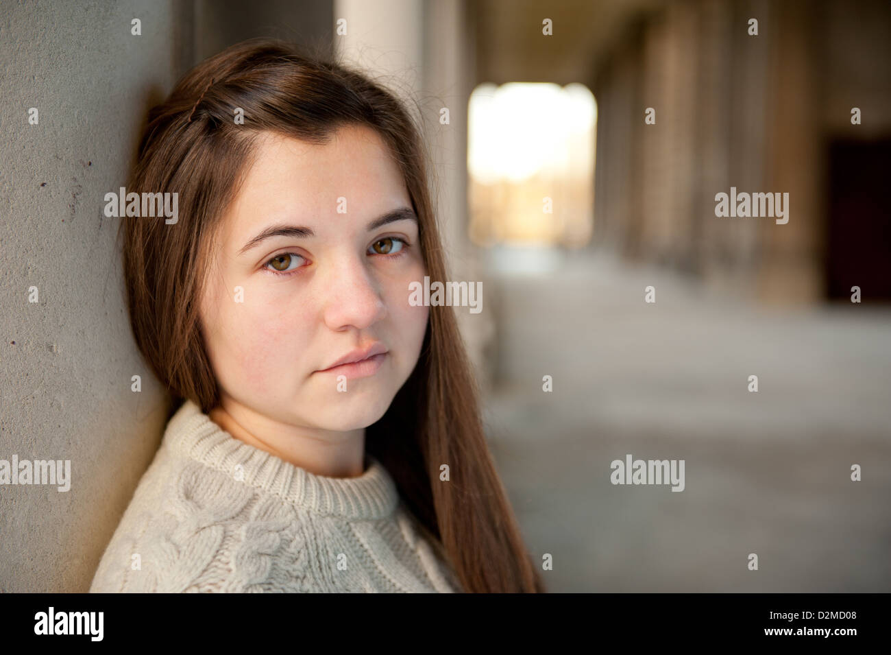 Girl leaning against column hi-res stock photography and images - Alamy