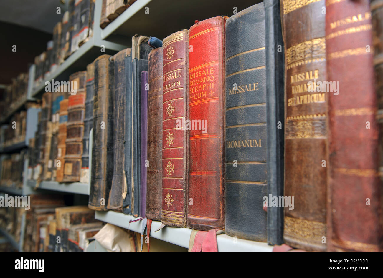 Aged old books in rows on bookshelf, monastery museum library Stock ...