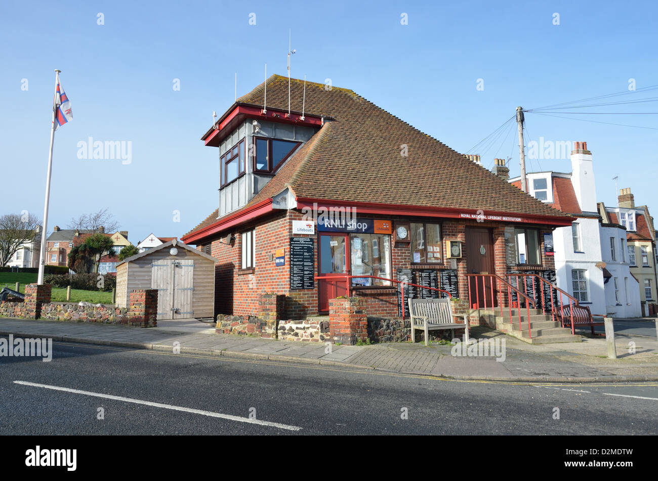 RNLI shop with flag Stock Photo - Alamy