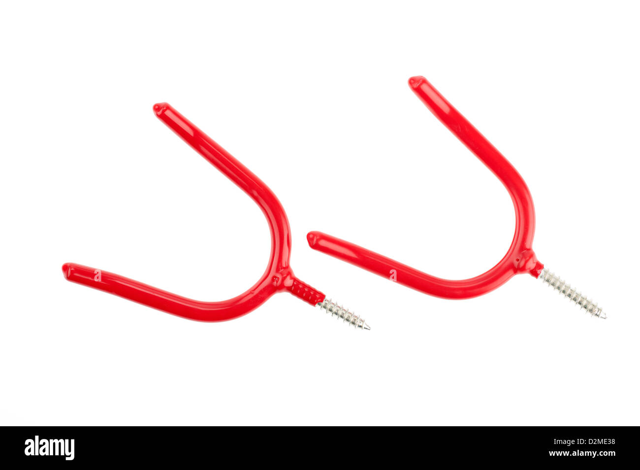 Two red plastic coated screw type tool storage hooks Stock Photo - Alamy