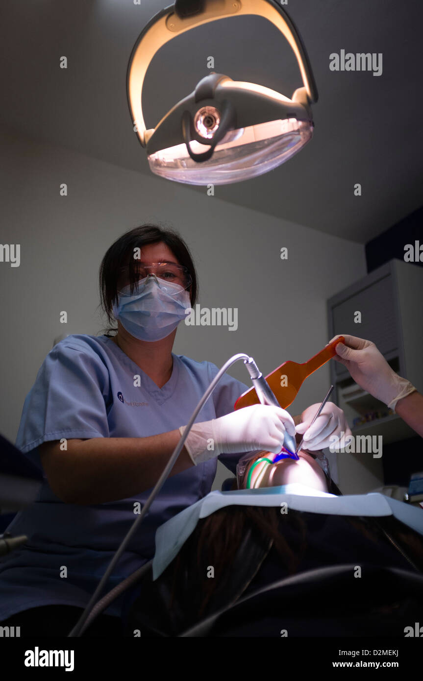 A teenage girl having fillings in her teeth at a National Health ...