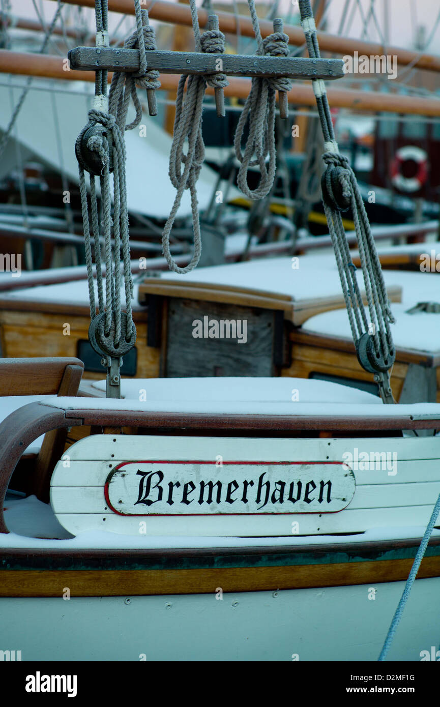 Early morning mist covers the surface of sailing boats anchoring in the ...