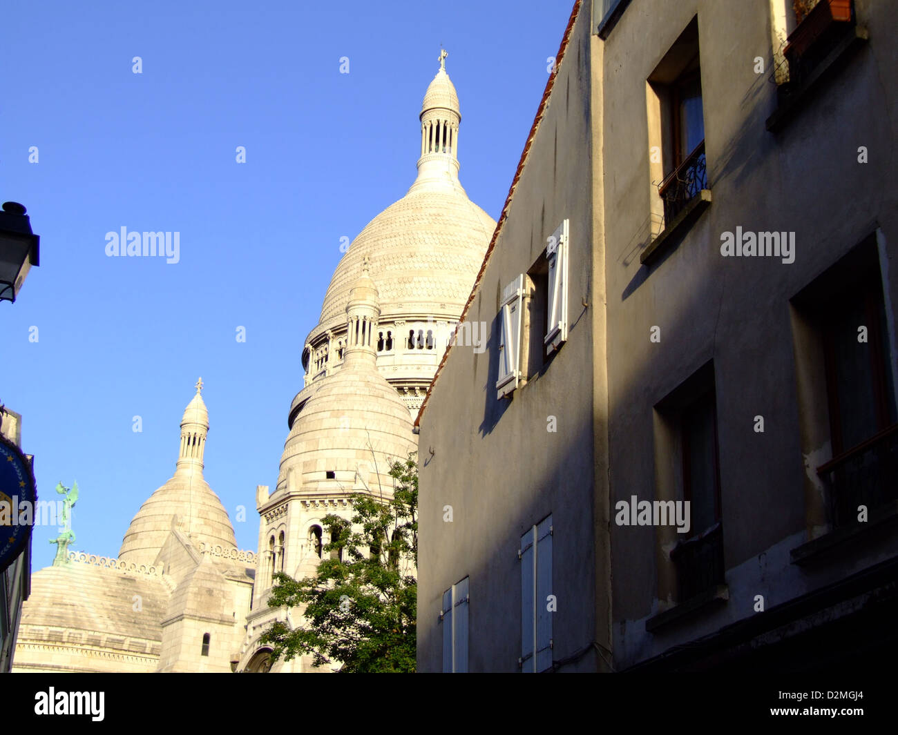 The Basilique du Sacré Coeur, located in Paris, France, is an iconic ...