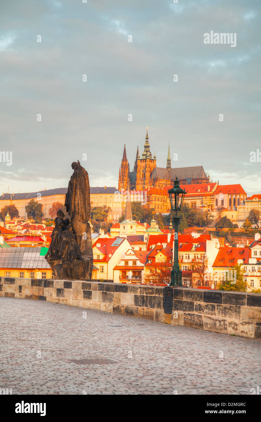 Overview of old Prague from Charles bridge side at sunrise Stock Photo - Alamy