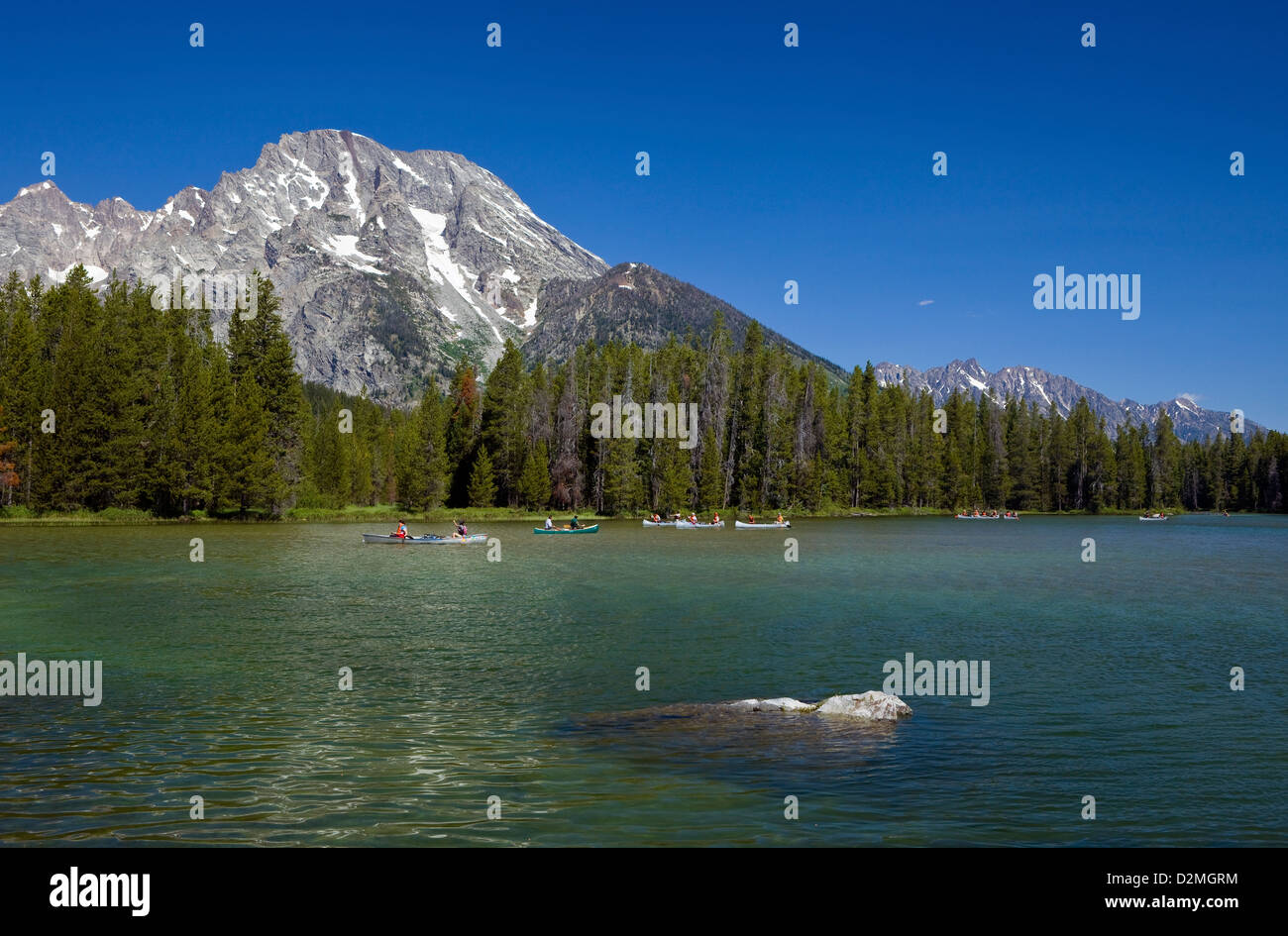 WY00308-00...WYOMING -Canoes on String Lake in Grand Teton National ...