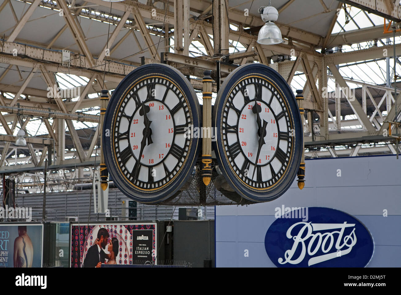 The clock high above Waterloo railway station in London Stock Photo - Alamy